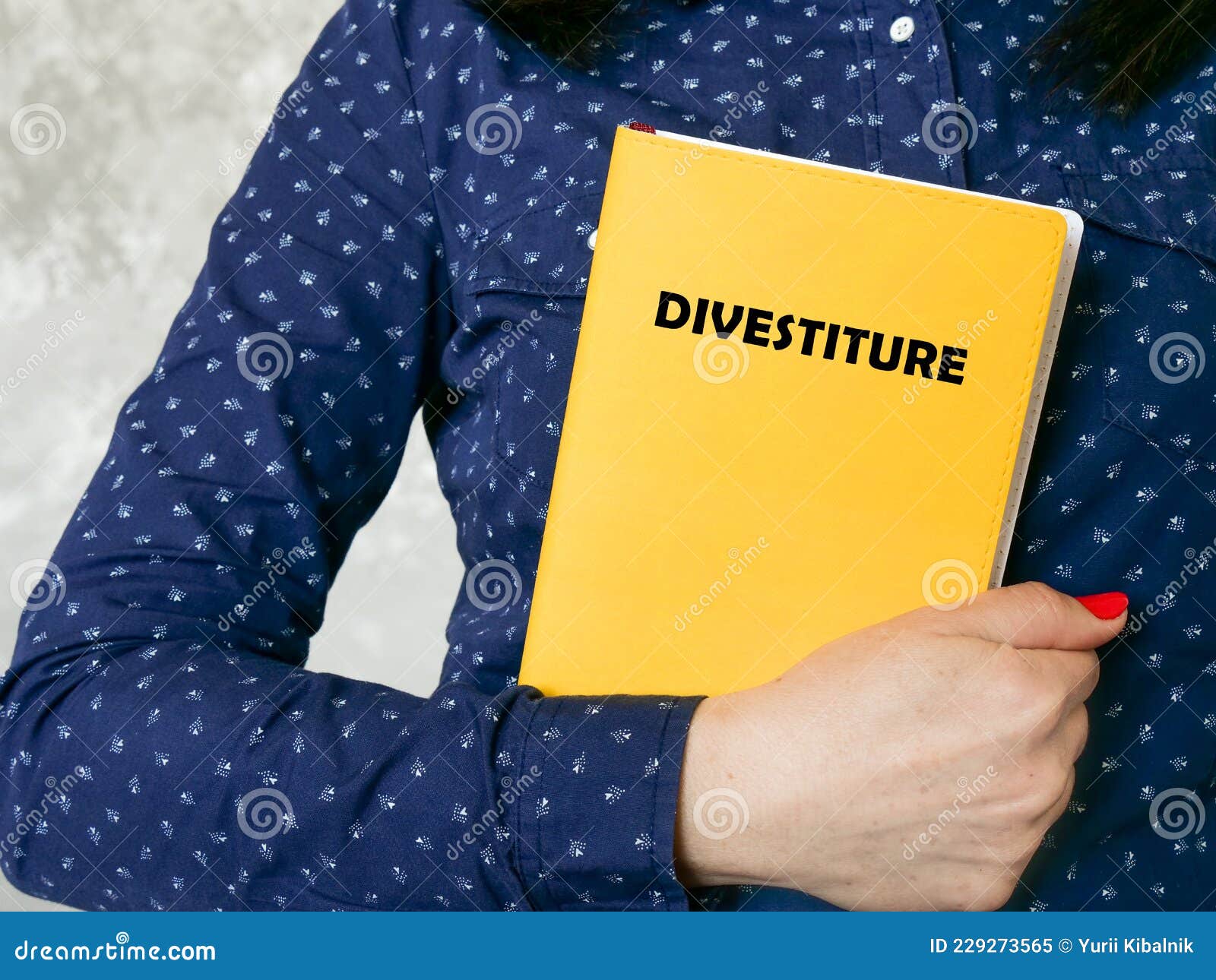 Financial Concept Meaning DIVESTITURE with Inscription on the Sheet ...