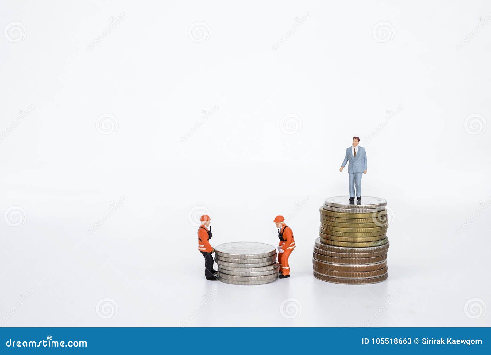 Miniature Business Man Standing on Stack of Coin and Miniature Worker ...
