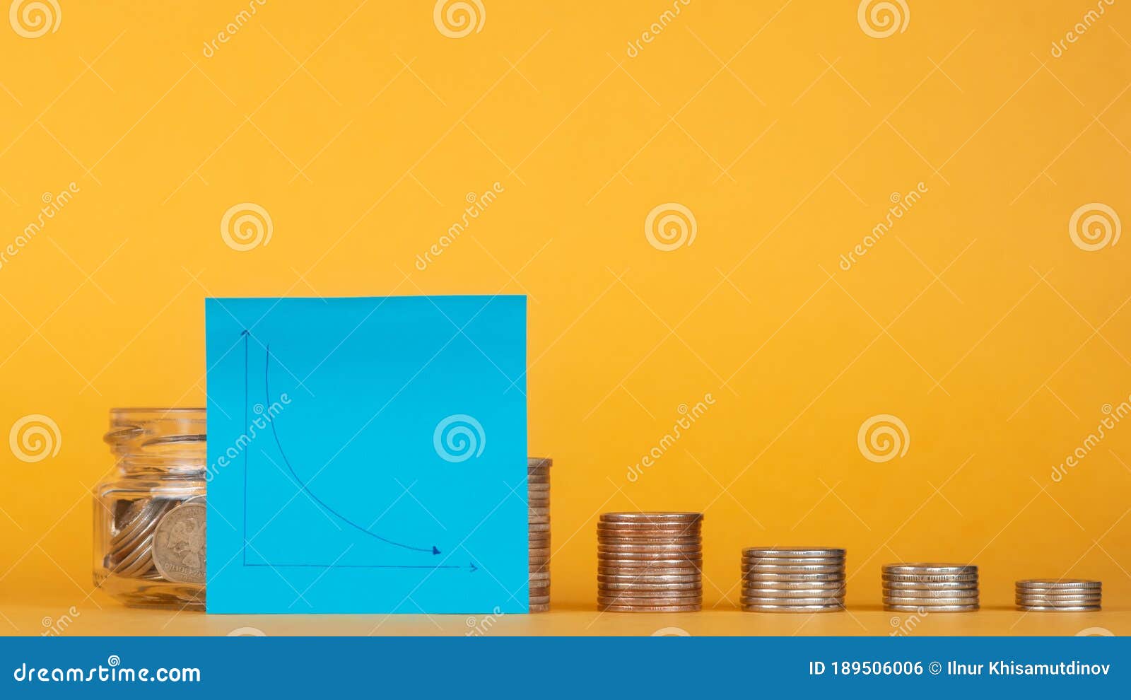 Financial Crisis. Pile of Coins with a Graph for a Fall Stock Photo ...
