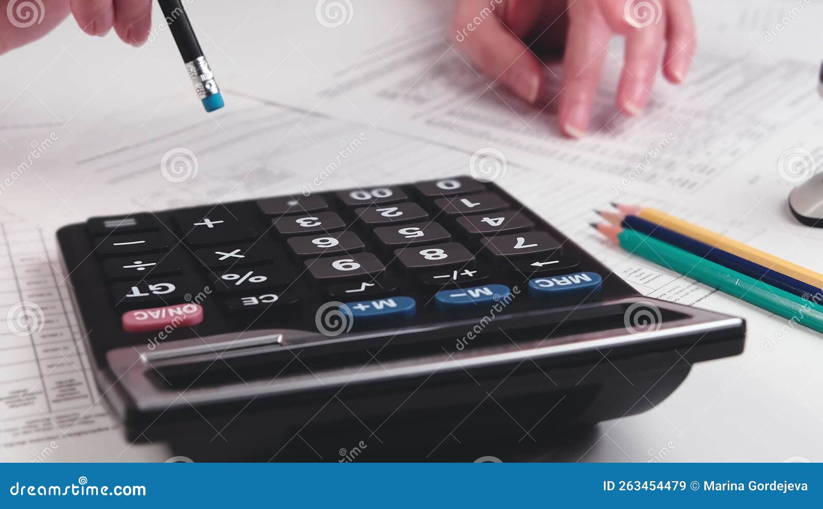 Financial Data, Analysis and Calculation on a Calculator in the Office ...