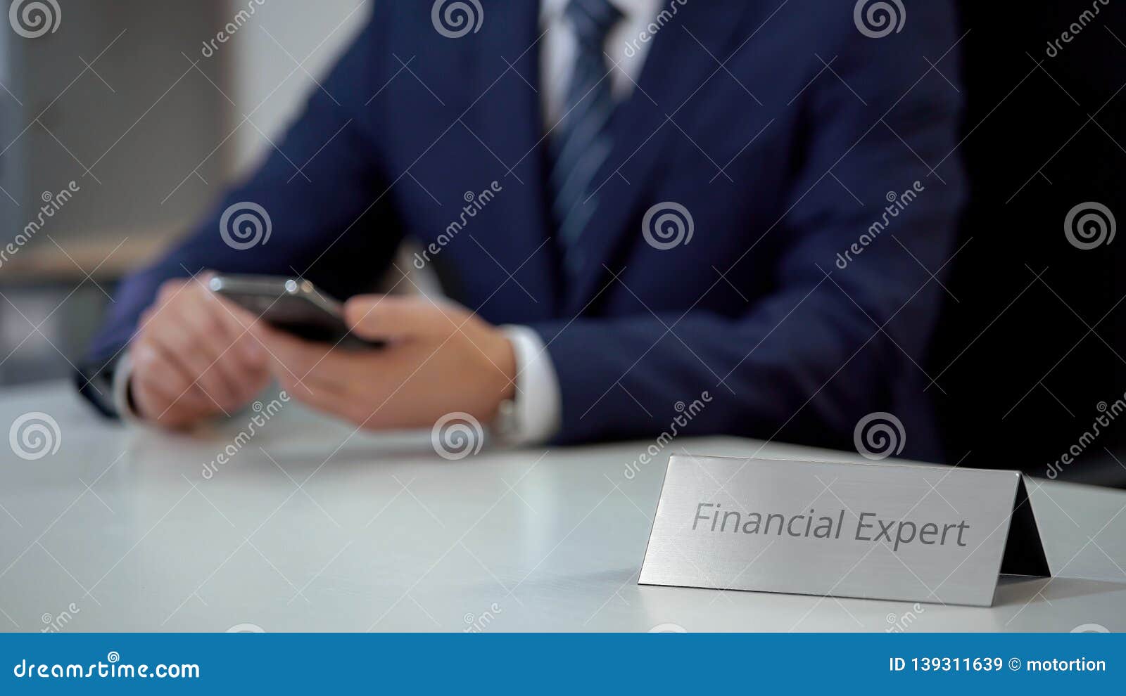 Financial Expert Using Mobile App on Smartphone, Analyzing Situation on ...