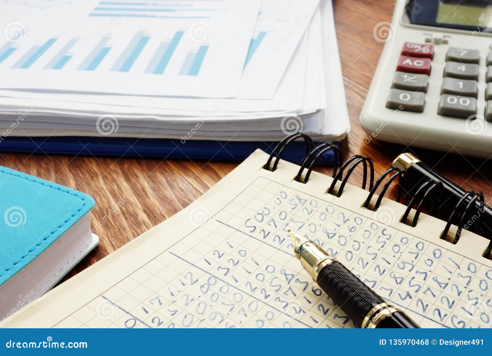 Financial Figures in an Accounting Book and Business Analytical Graphs ...