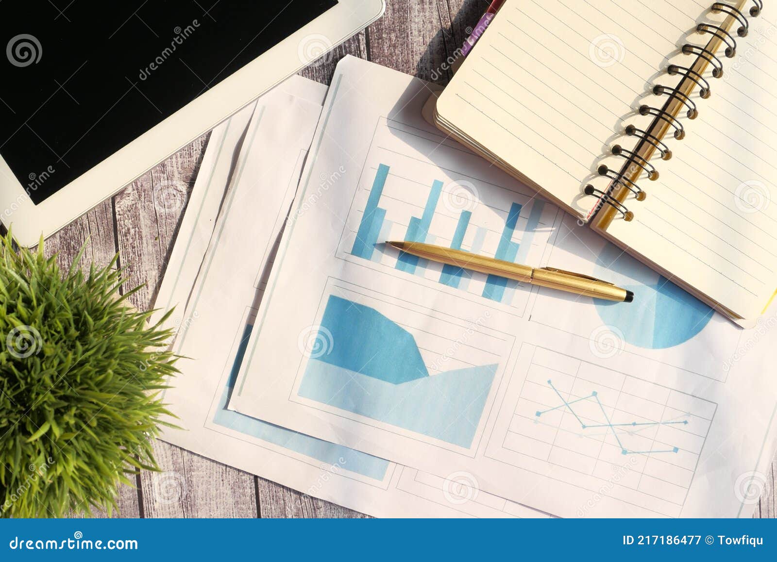 Financial Graph, Calculator and Notepad on Table Stock Image - Image of ...