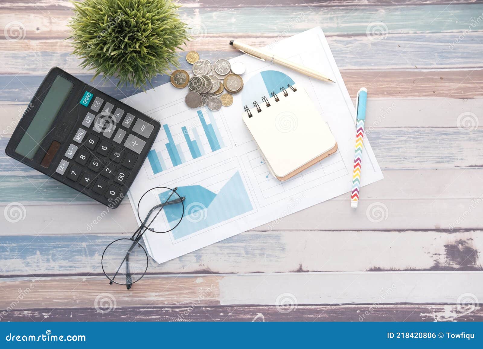 Financial Graph, Calculator and Notepad on Table Stock Photo - Image of ...