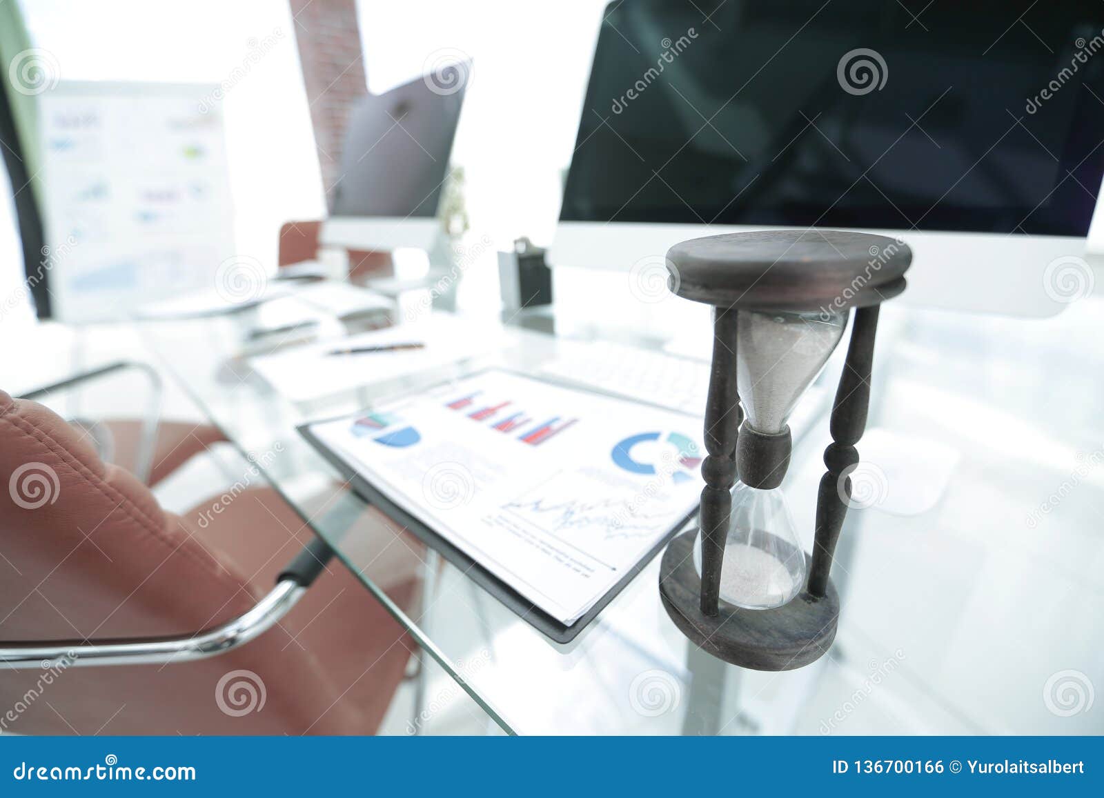 Financial Graph and the Hourglass on the Desk Stock Photo - Image of ...