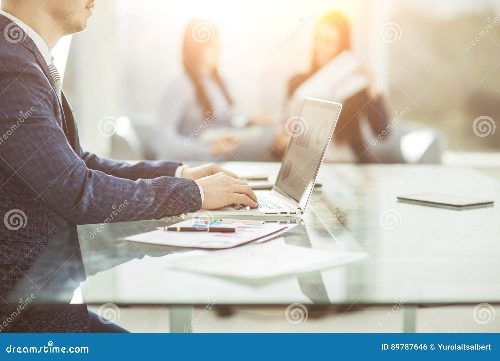 Financial Managers Working on Laptop with Financial Data at the ...