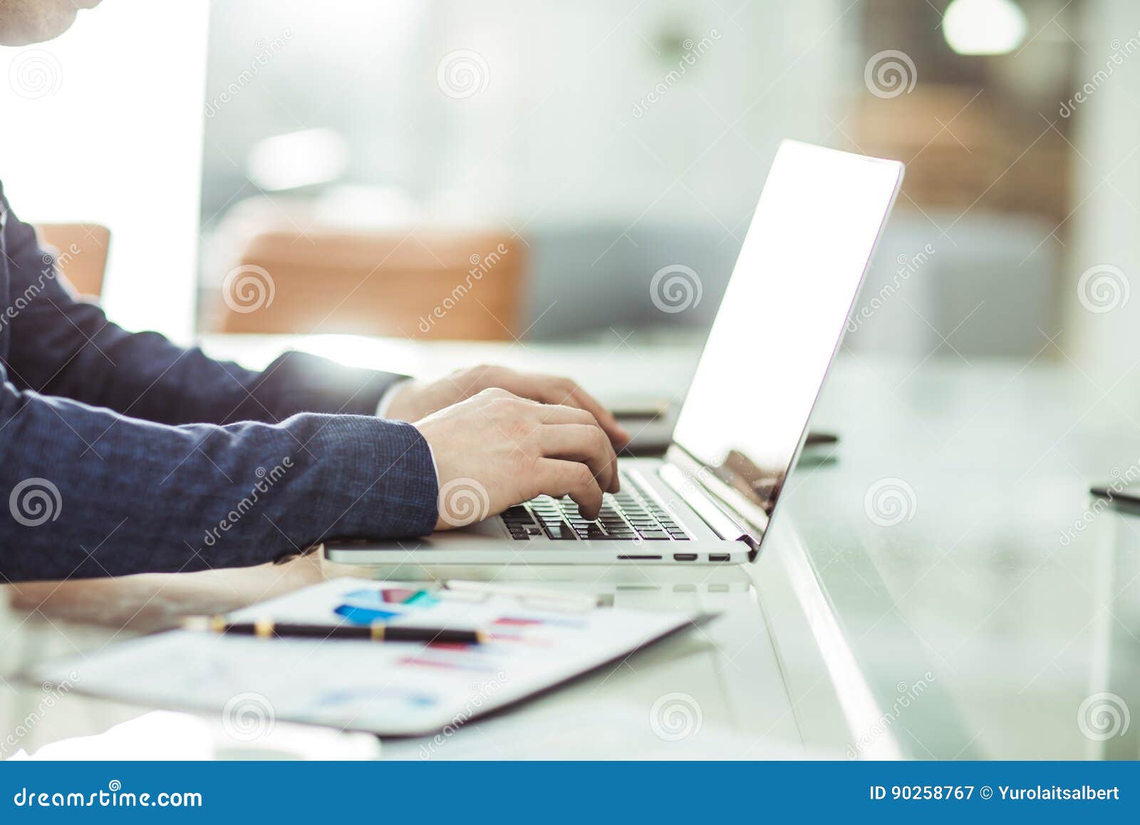 Financial Managers Working on Laptop with Financial Data at the ...