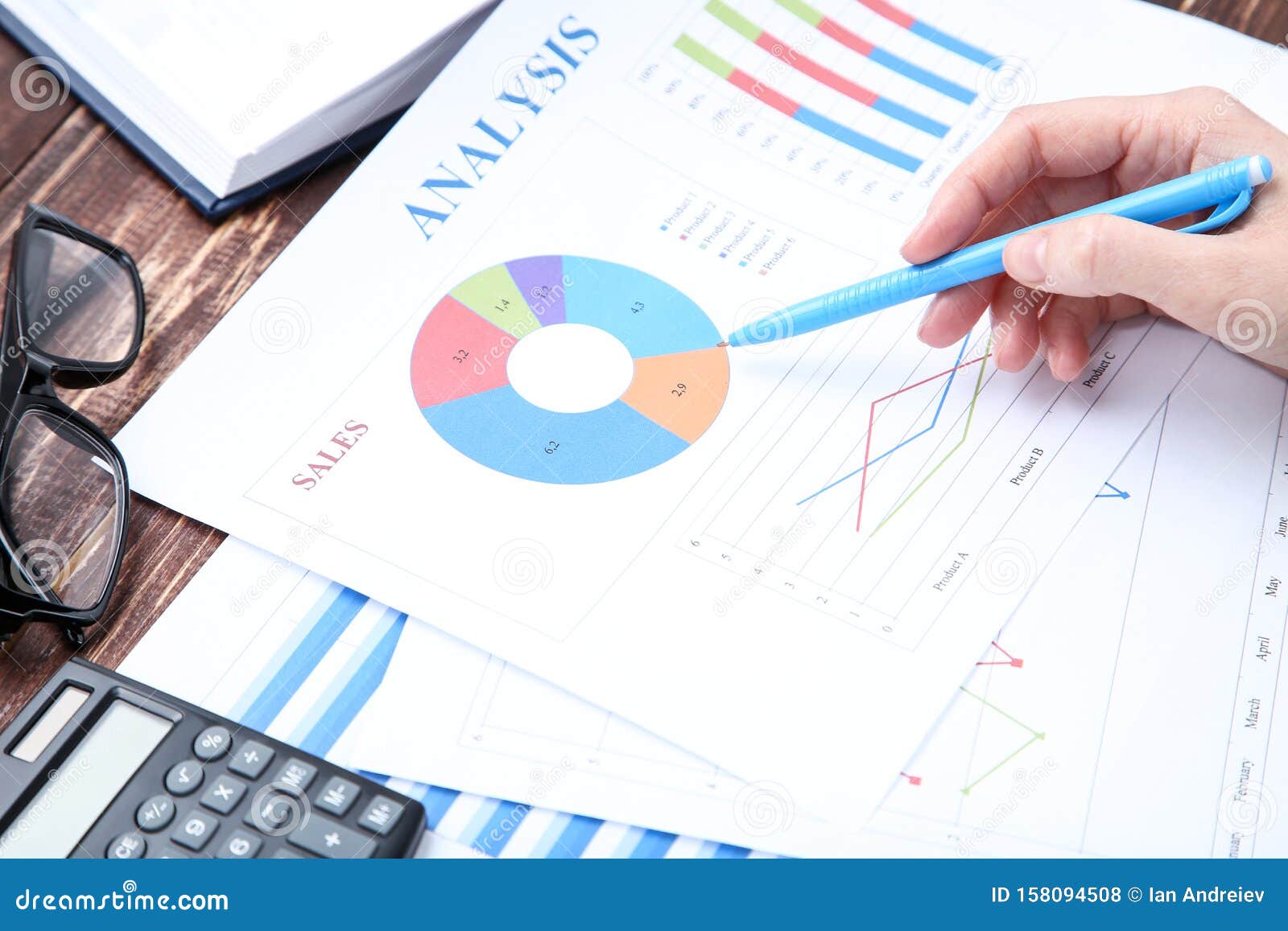 Financial papers stock photo. Image of business, hand - 158094508