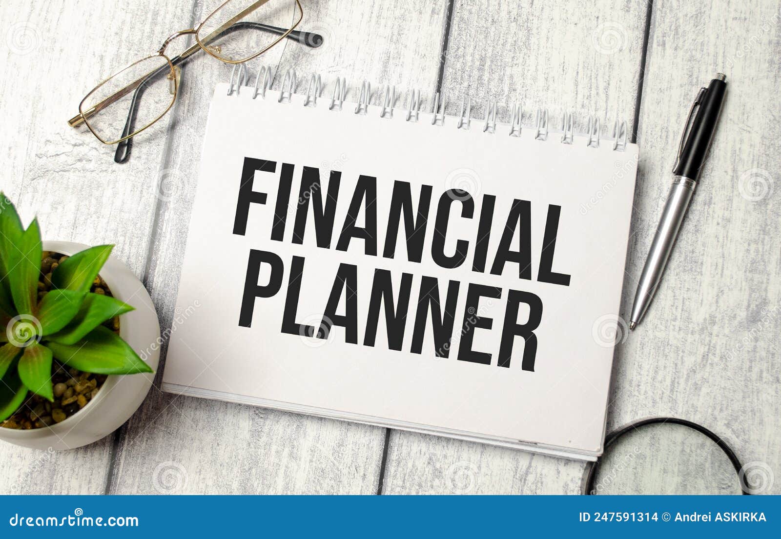 FINANCIAL PLANNER on Notepad with Pen, Glasses and Calculator Stock ...