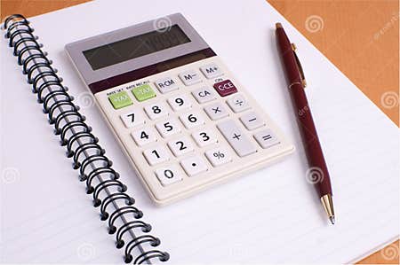 Financial Planning Notepad with Calculator and Pen Stock Image - Image ...