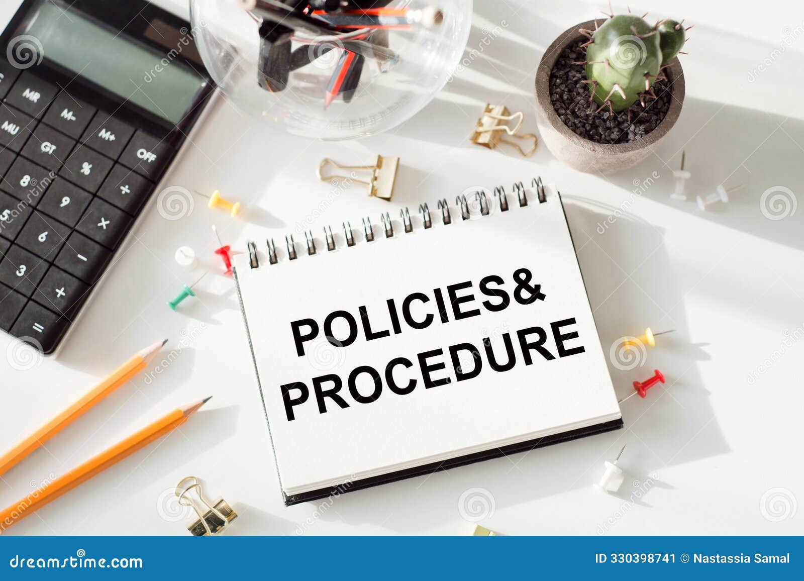 Financial Policies and Procedures Notebook on White Desk Stock Image ...