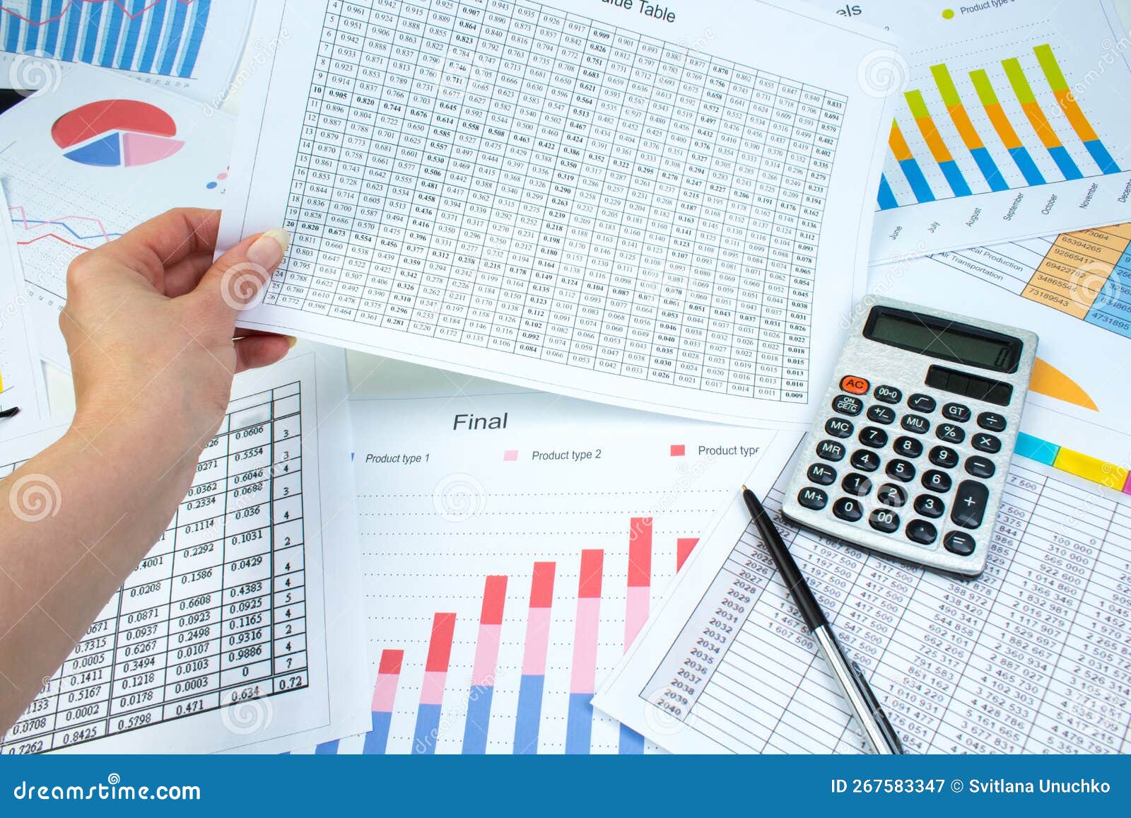 Financial Printed Paper Charts, Graphs and Diagrams on the Table. Top ...