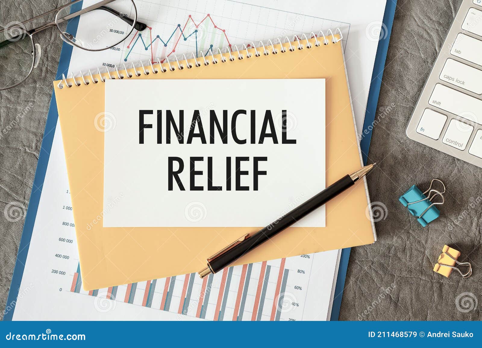 FINANCIAL RELIEF is Written in a Document on the Office Desk Stock ...