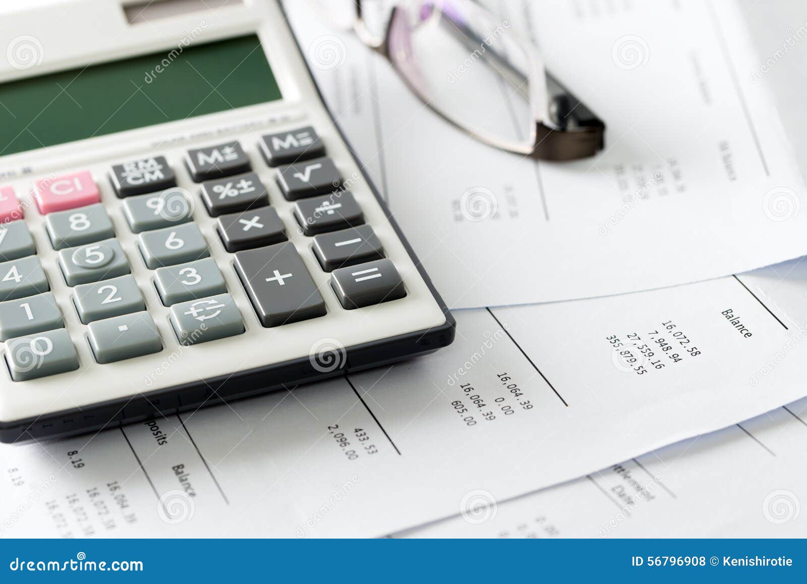 Financial Statement with Calculator and Glasses Stock Photo - Image of ...