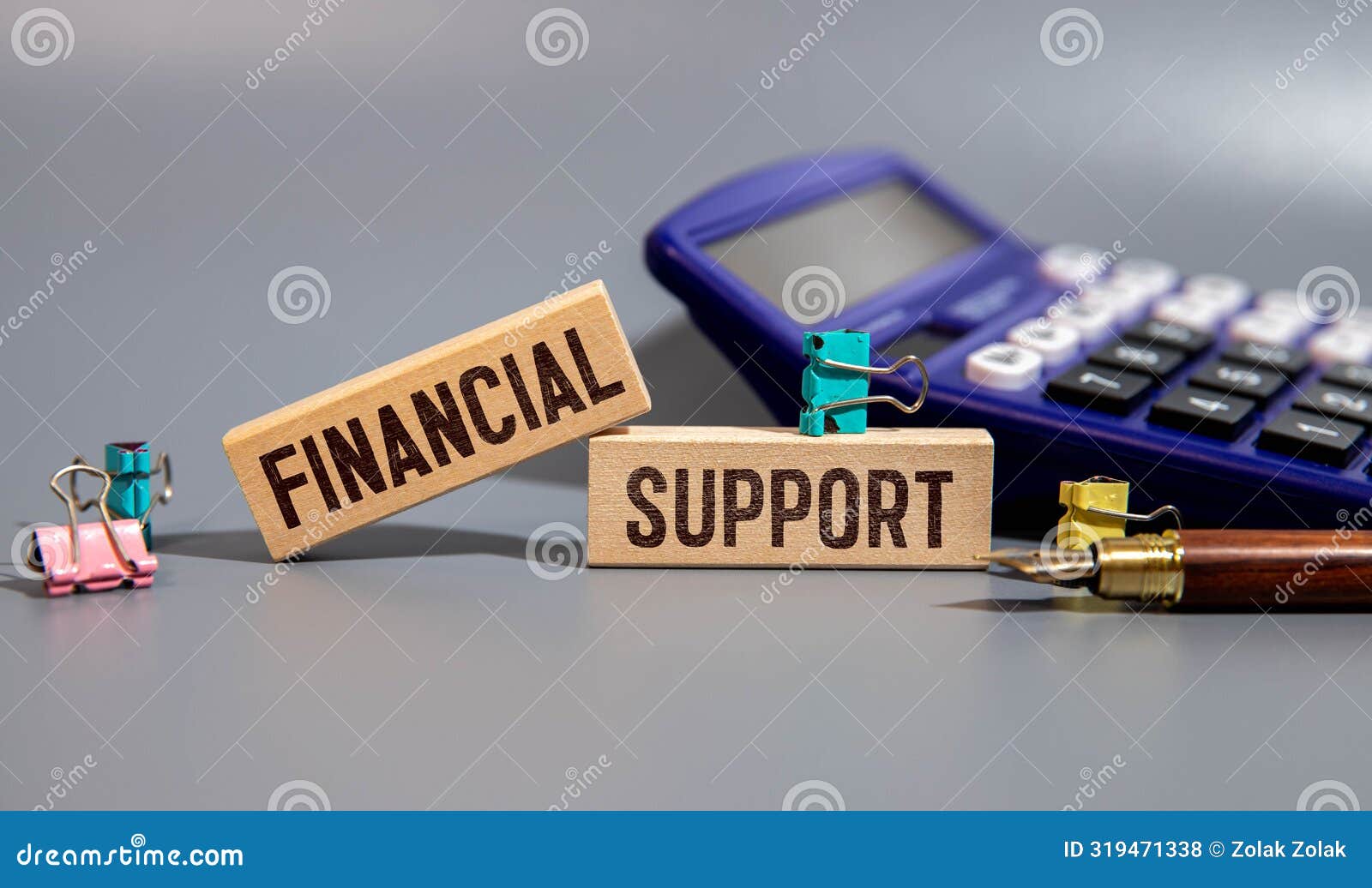 FINANCIAL SUPPORT Text on Wooden Block, Blue Background Stock Photo ...