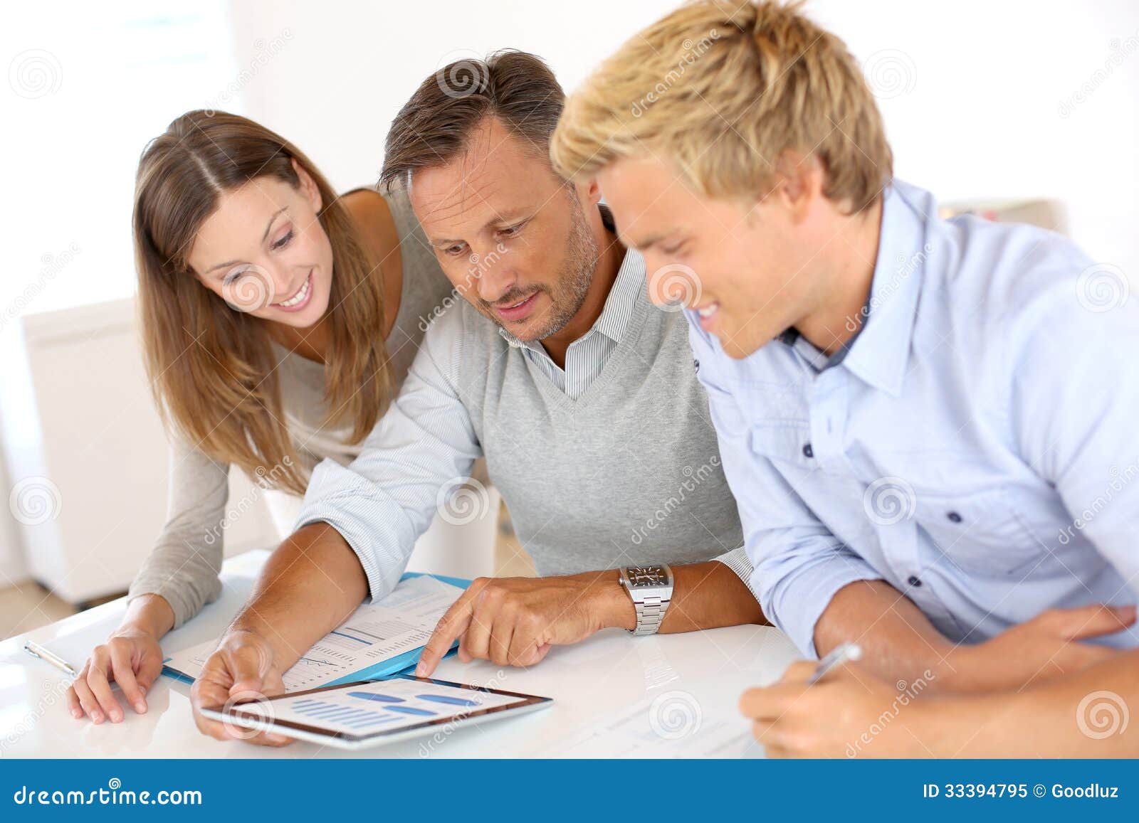 Financial Team Checking Graphs in Office Stock Image - Image of company ...