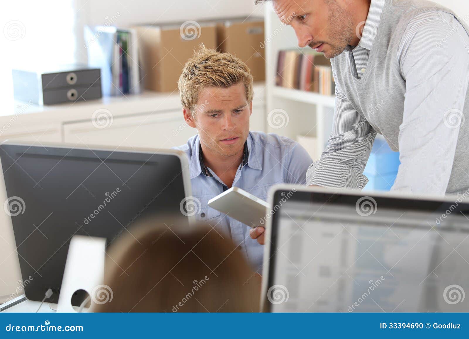 Financial Team Talking Together in Office Stock Photo - Image of ...