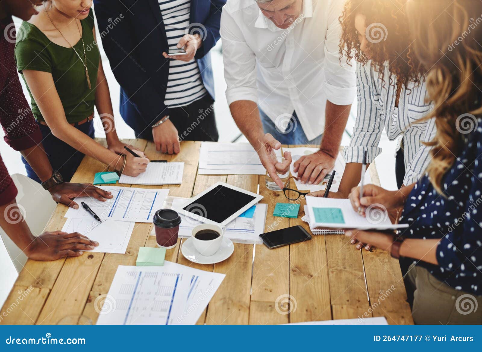 We Find Issues and Solutions Together As a Team. a Group of ...