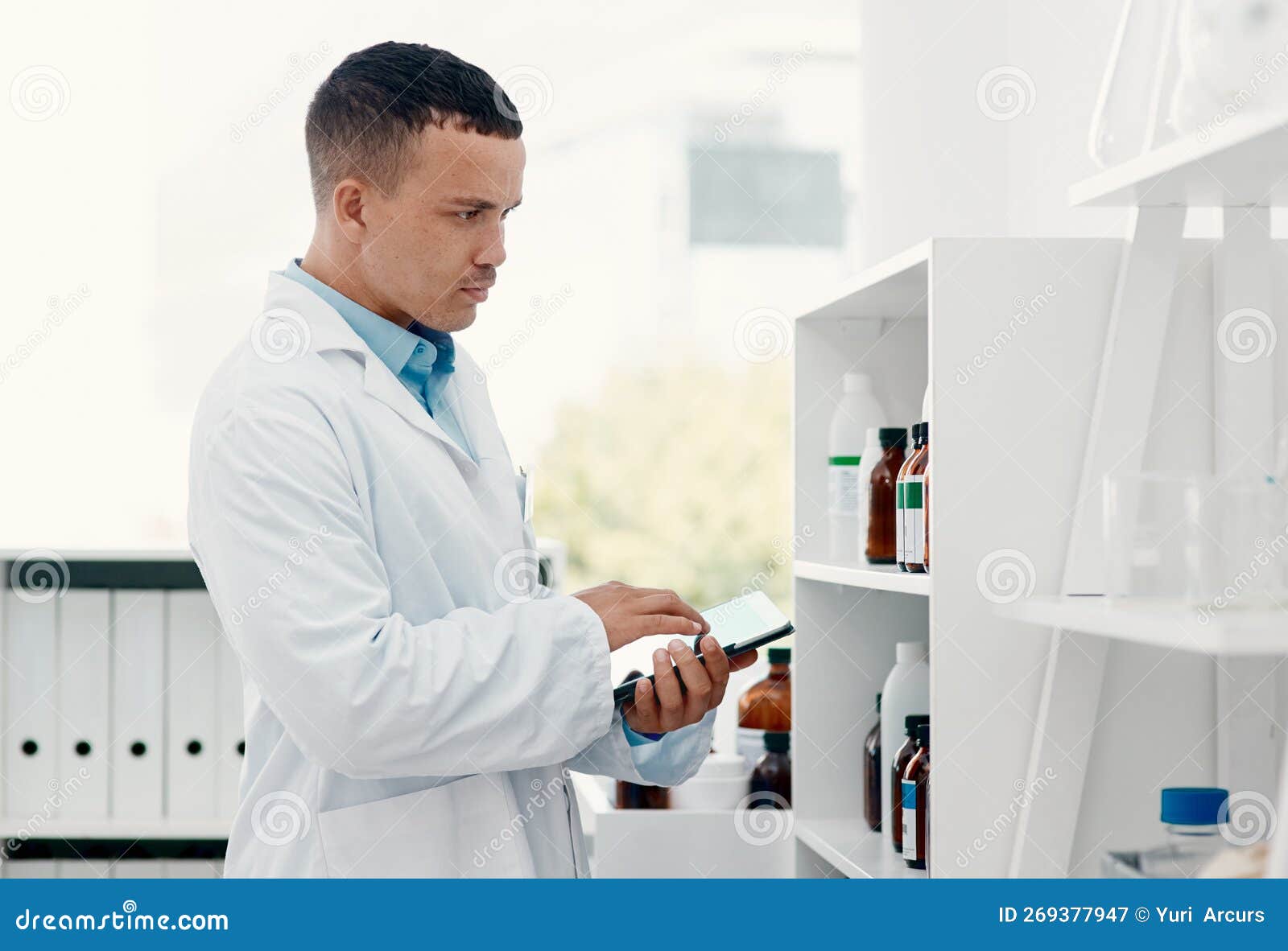 Finding a Cure is First Priority. a Young Scientist Using a Digital ...