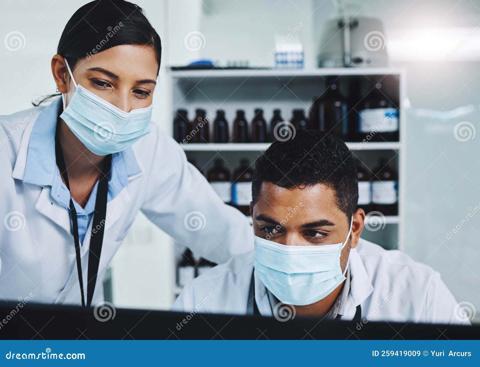 Finding Solutions To Real Life Problems. Two Young Researchers Using a ...