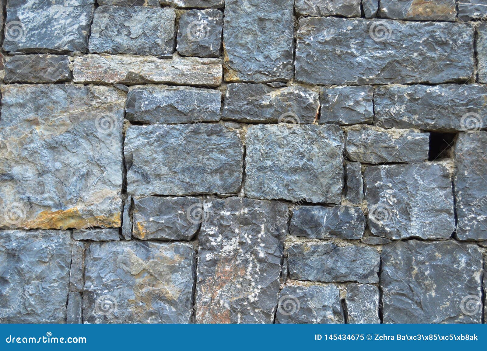 Fine cut blue stone wall stock image. Image of granite - 145434675