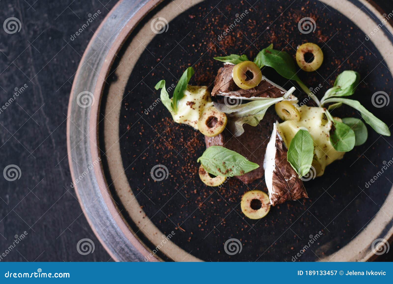 Fine Dining Meal on Plate. Cheese with Olives Stock Image - Image of ...