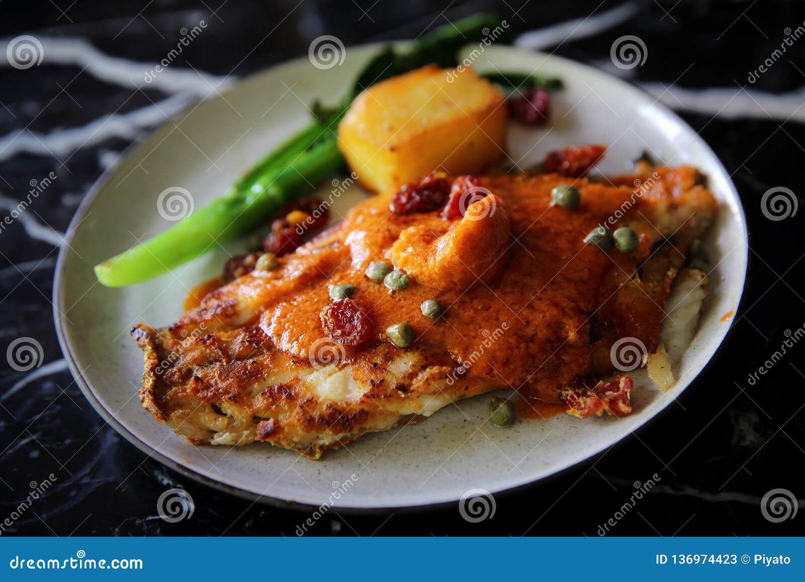 Fine Dining Seabass Fillets with Tomato and Spices Sauce Stock Image ...