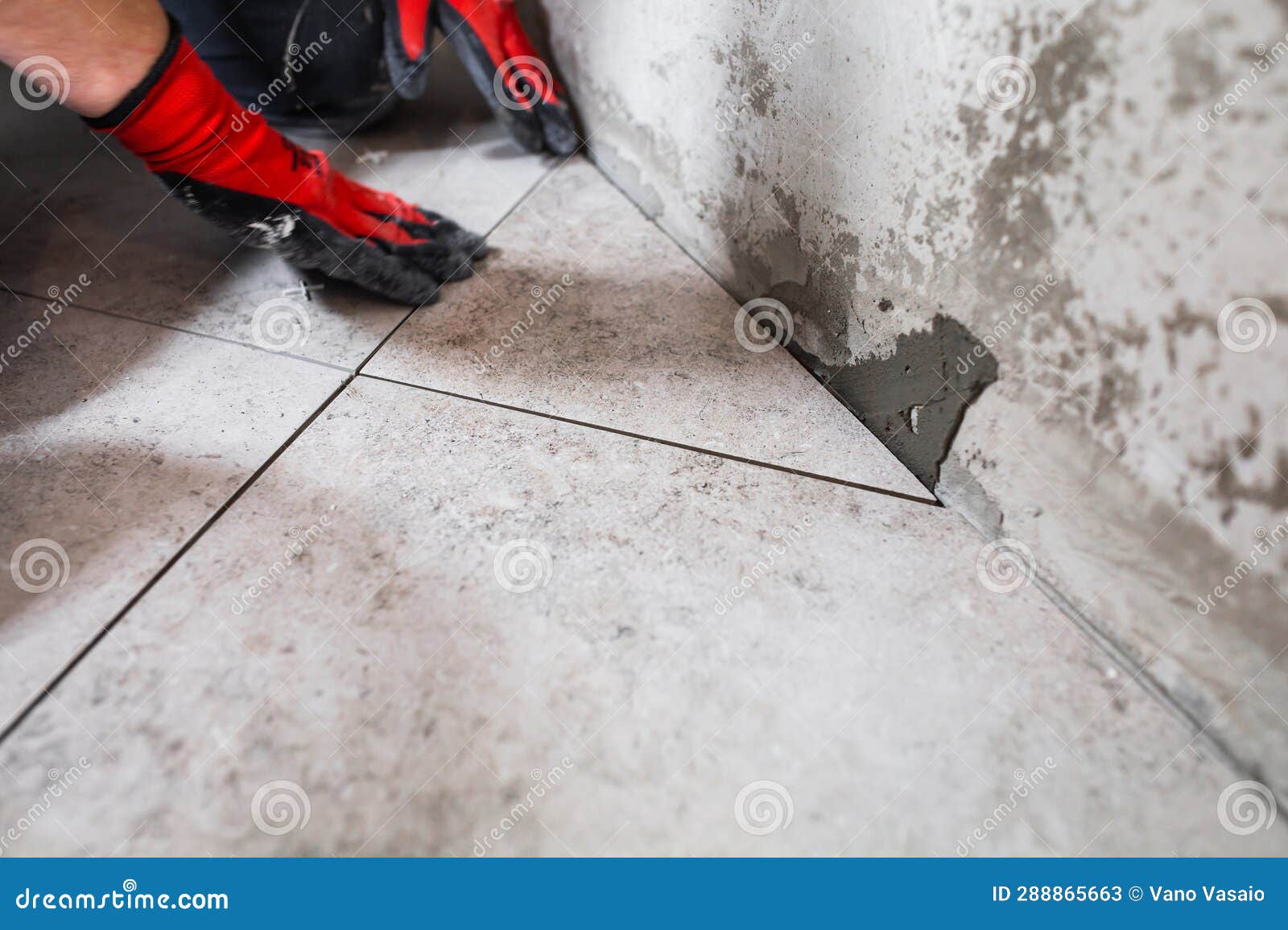Fine Precise Accurate Work of a Tiler when Laying Tiles on the Floor ...
