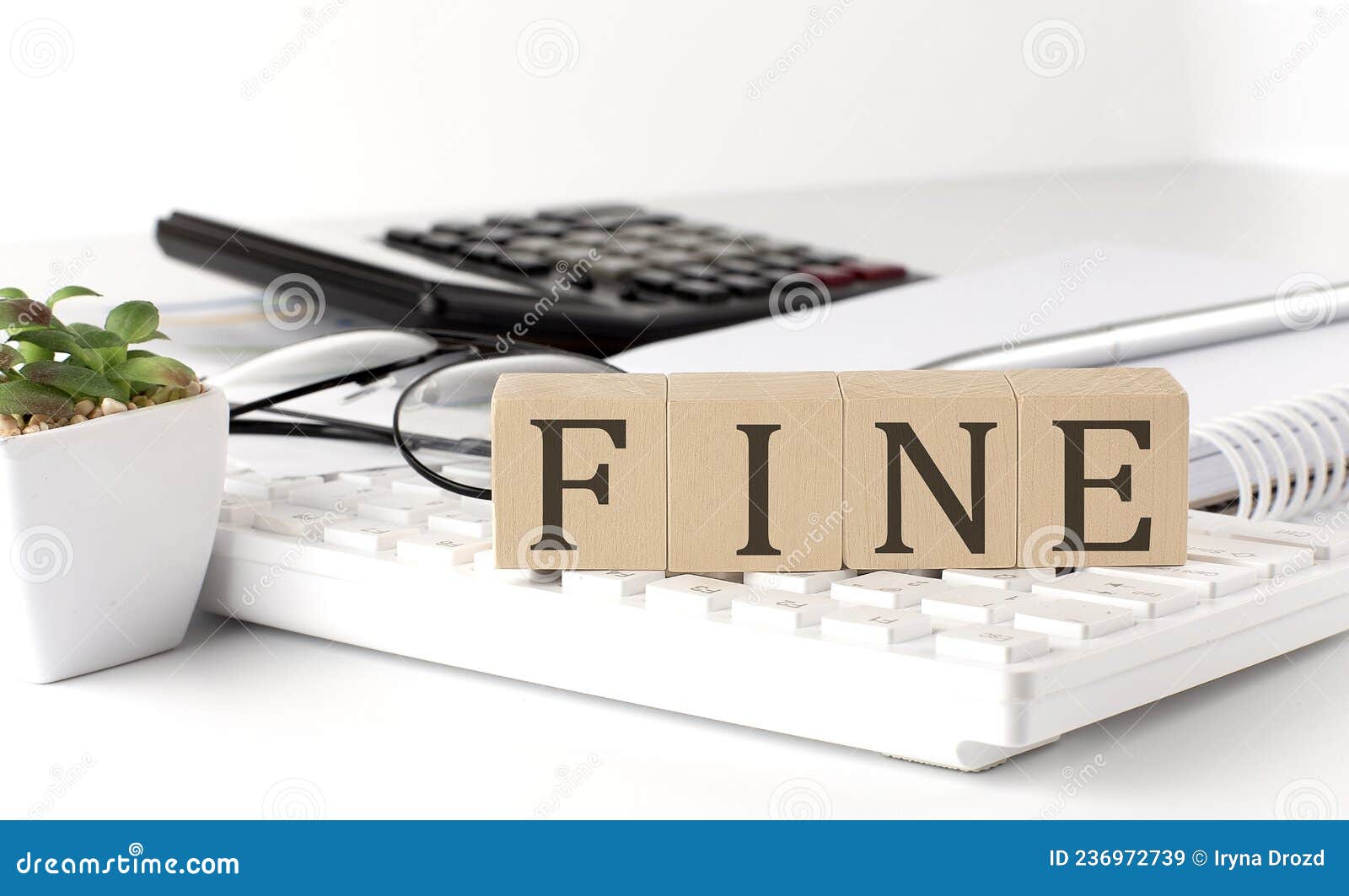 FINE Written on a Wooden Cube on Keyboard with Office Tools Stock Image ...