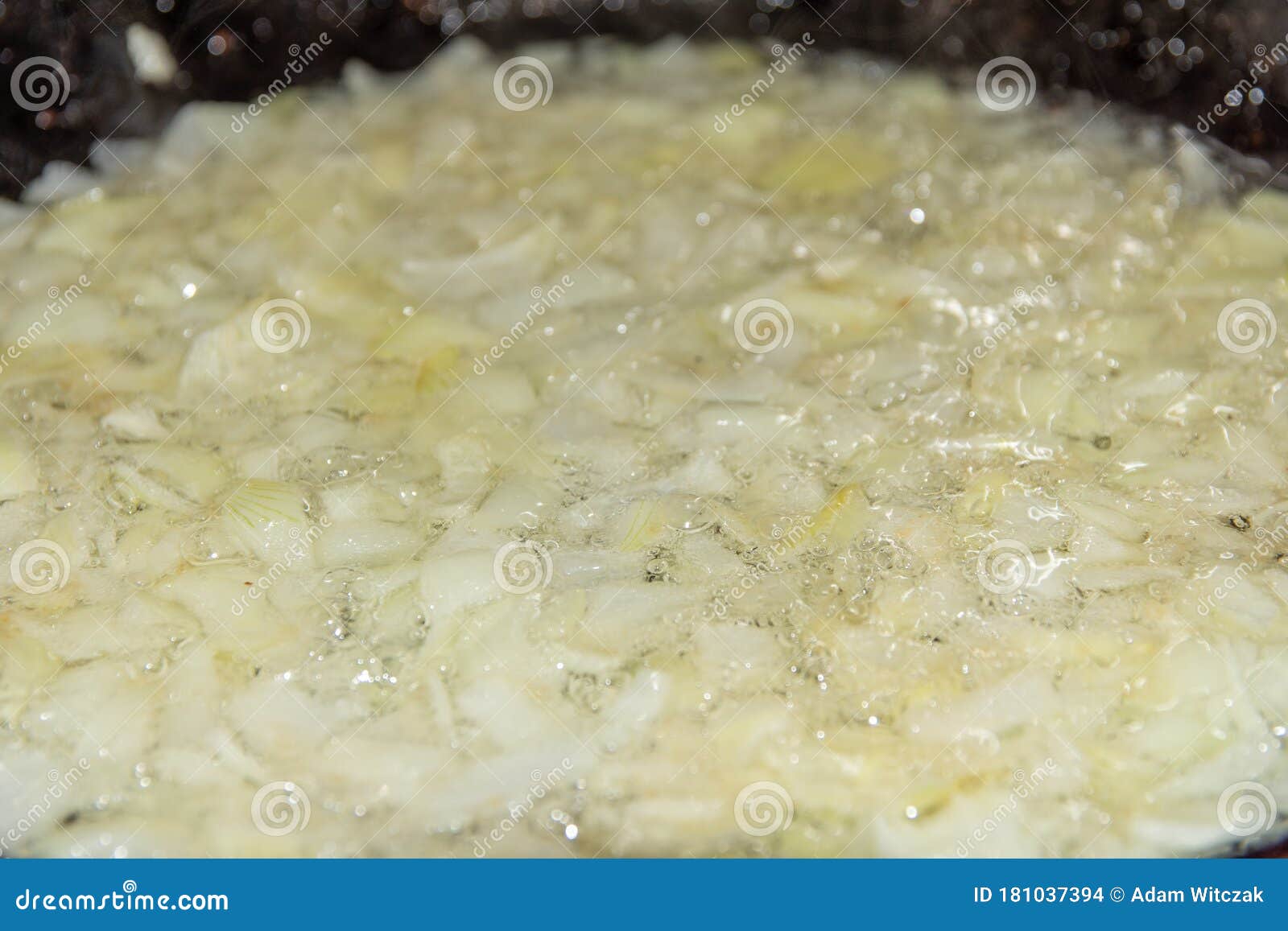 Finely Chopped Onion Fried in a Pan Stock Photo - Image of frying, hand ...