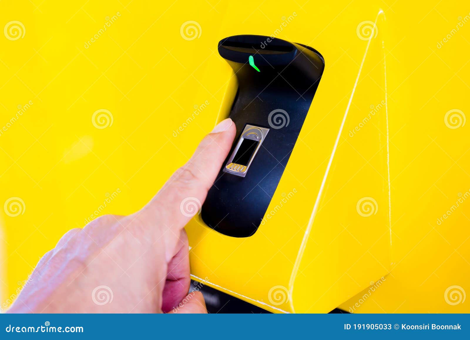 Finger Biometric Scanner With Blurry Finger On Yellow Machine Stock ...