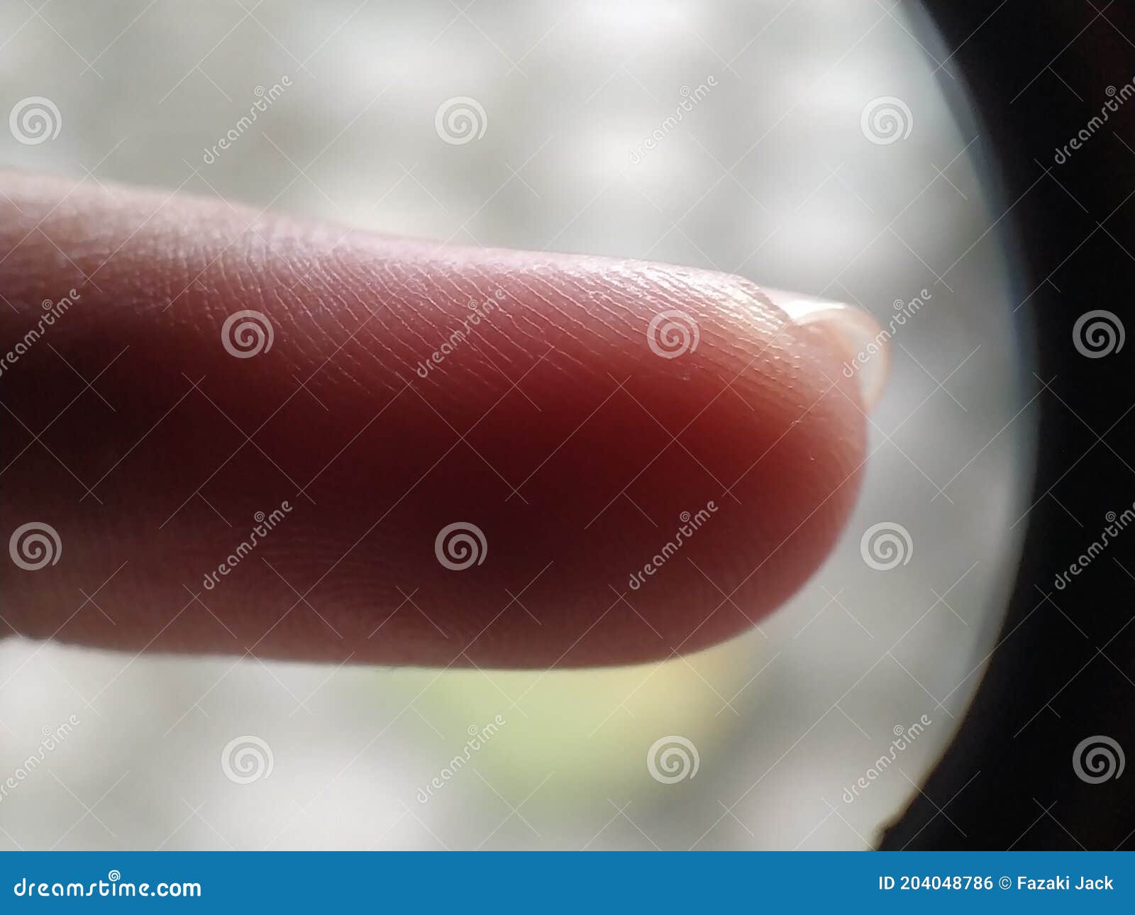 A Finger from a Close Up Shot Stock Photo - Image of nose, mouth: 204048786