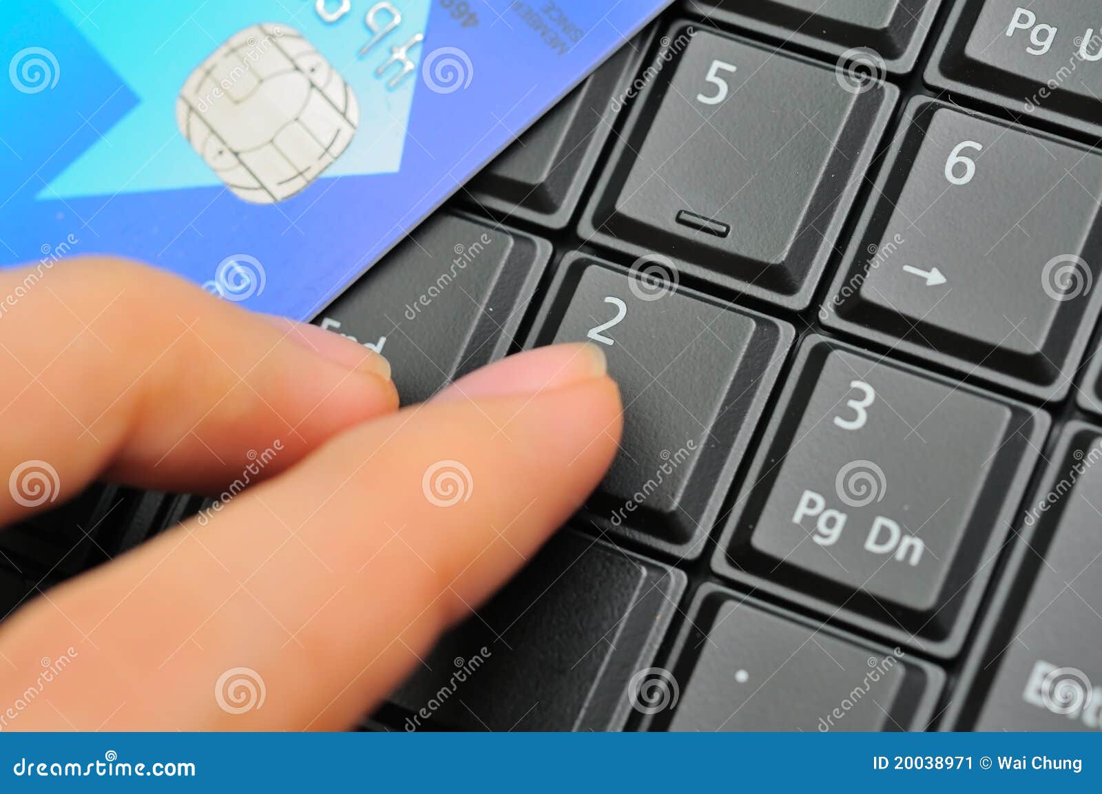 Finger and Credit Card on Keypad Stock Image - Image of private ...