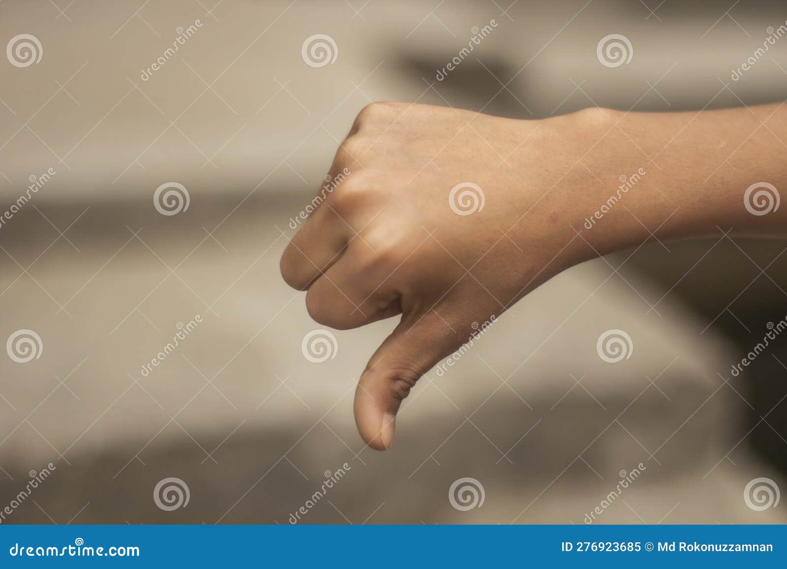 A Finger of a Hand is Pressed Down and the Background is Blurred Stock ...