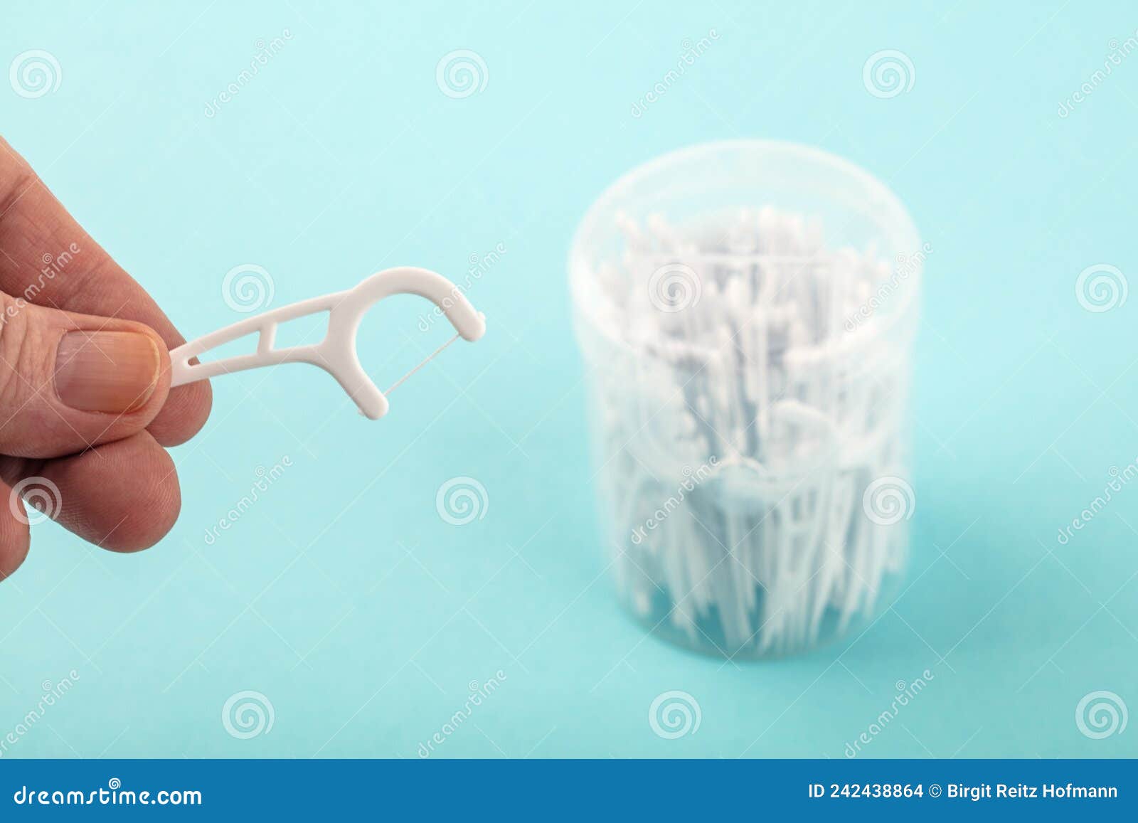 Finger hold Dental Floss stock photo. Image of oral - 242438864