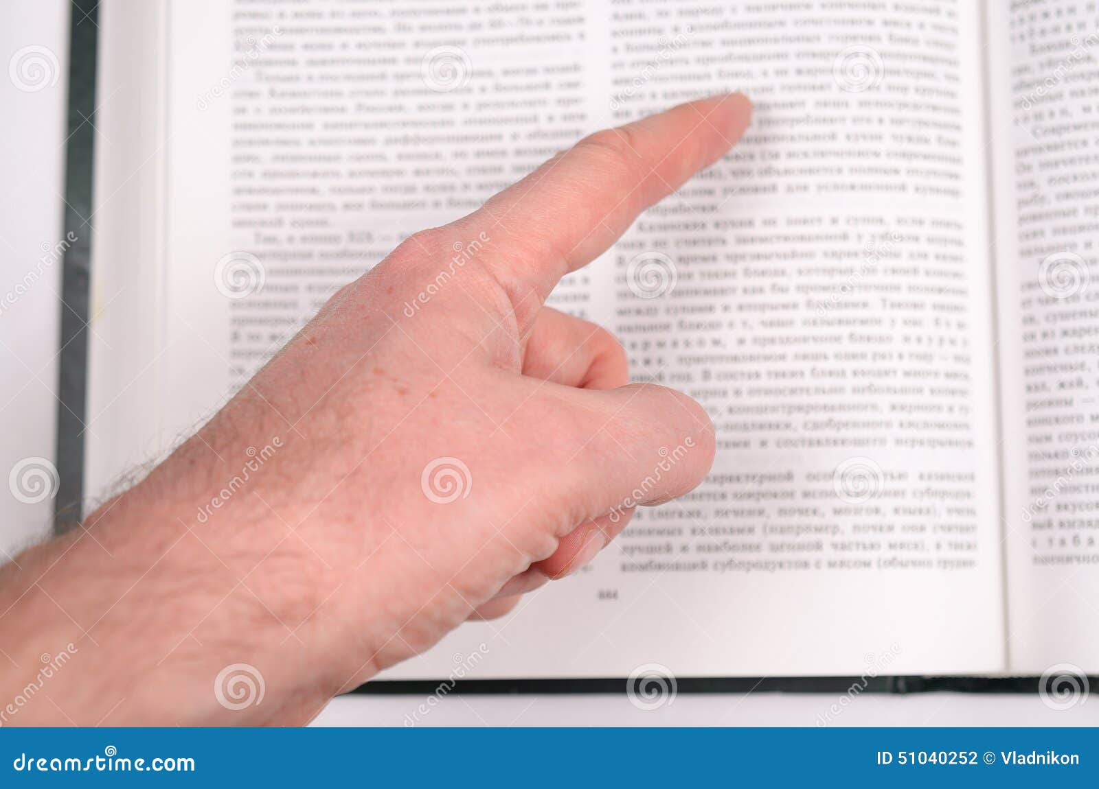 Finger hows an open book. stock photo. Image of gesture - 51040252