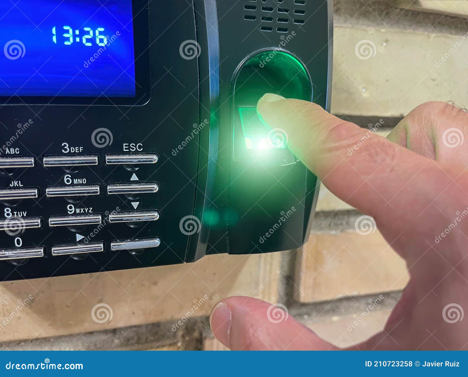 A Finger Placed on an Access Control Terminal with Fingerprint, Laser ...