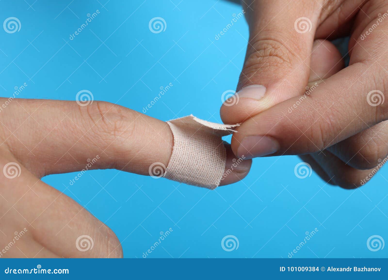 Finger with a plaster stock photo. Image of patch, human - 101009384