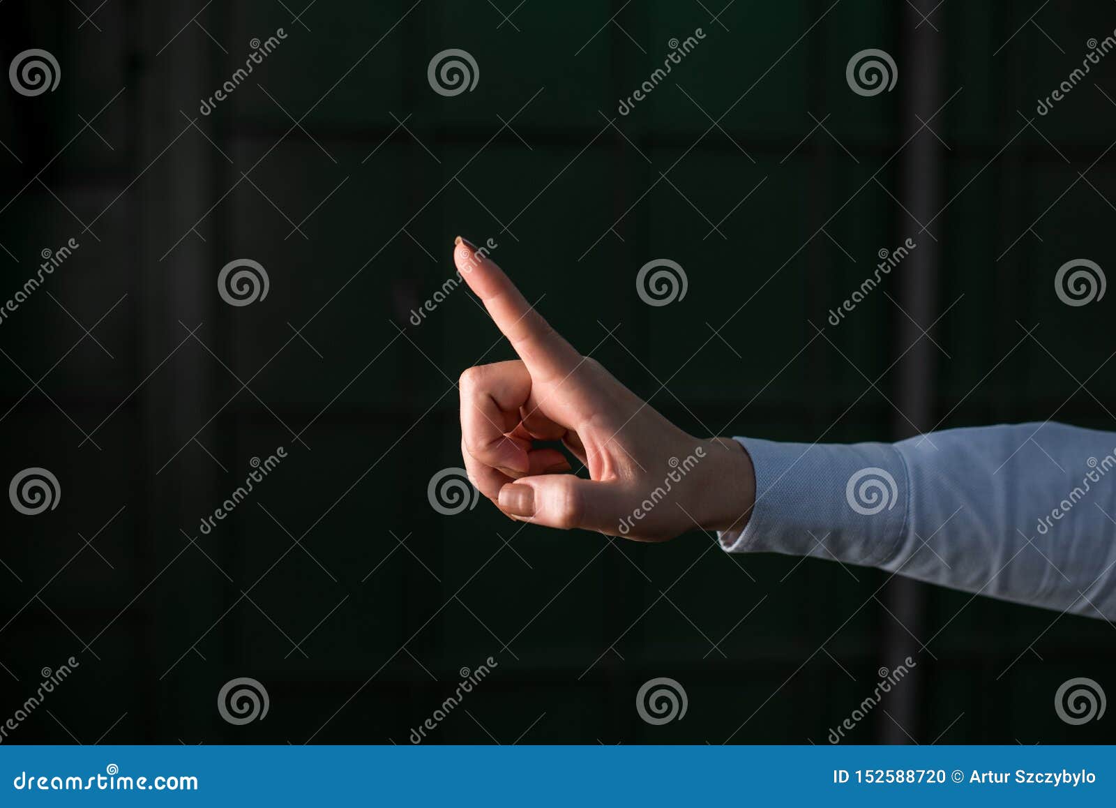Finger Pointing in the Empty Space. Dark Background with Hand Pointing ...
