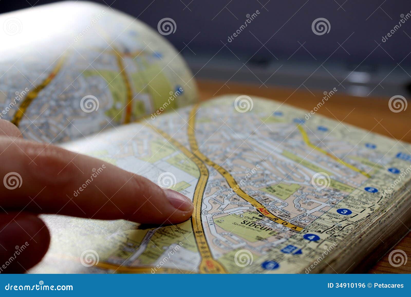 Finger Pointing at Map stock photo. Image of directions - 34910196