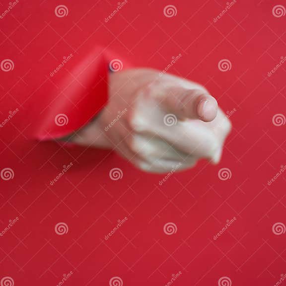 Finger Pointing through Red Paper Stock Photo - Image of concepts, hand ...