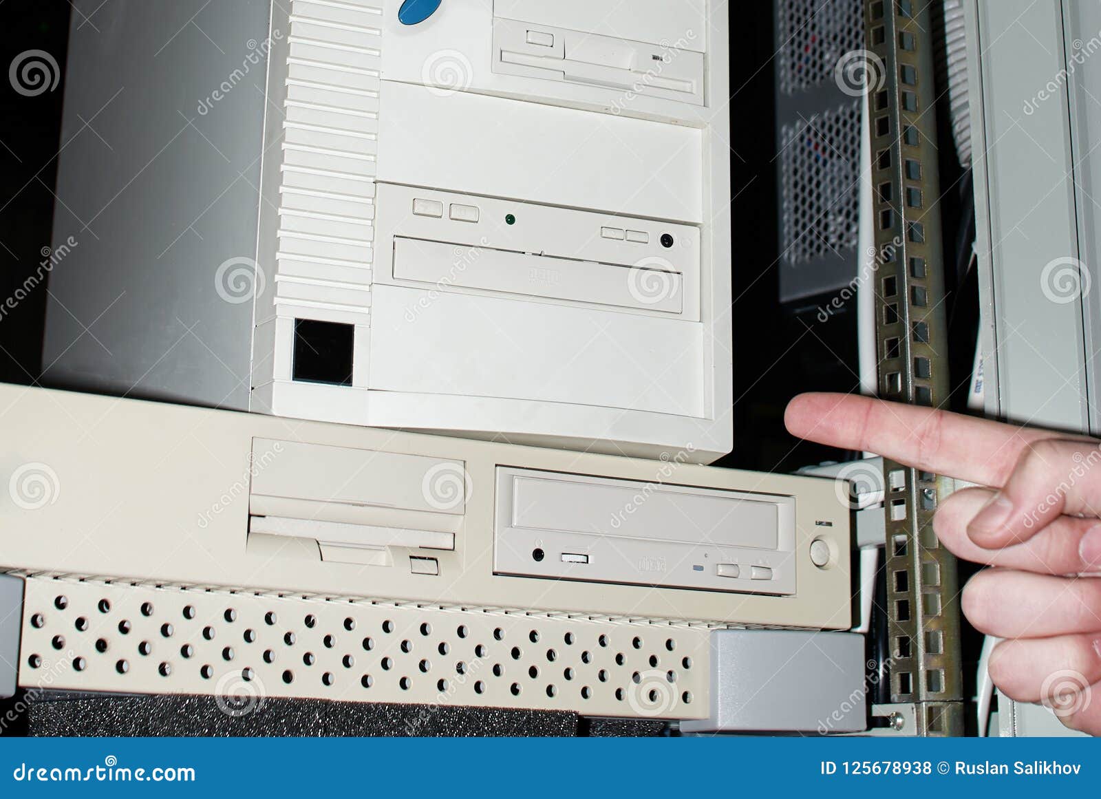 Finger Pointing To Server Mounted in a Rack Upside Down Stock Photo ...