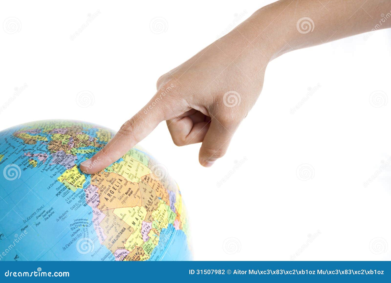 A Finger Pointing To Spain In A World Globe Stock Photography ...