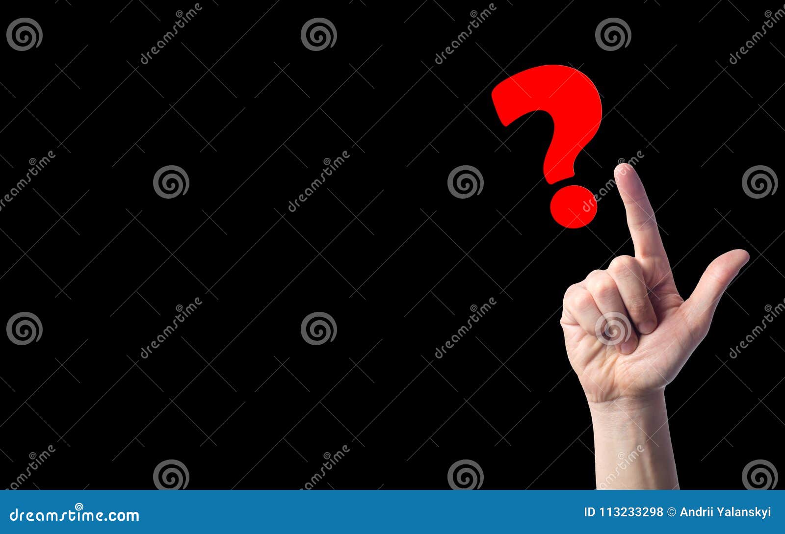 Finger Points To Question Marks on Black Isolated Background. Concept ...