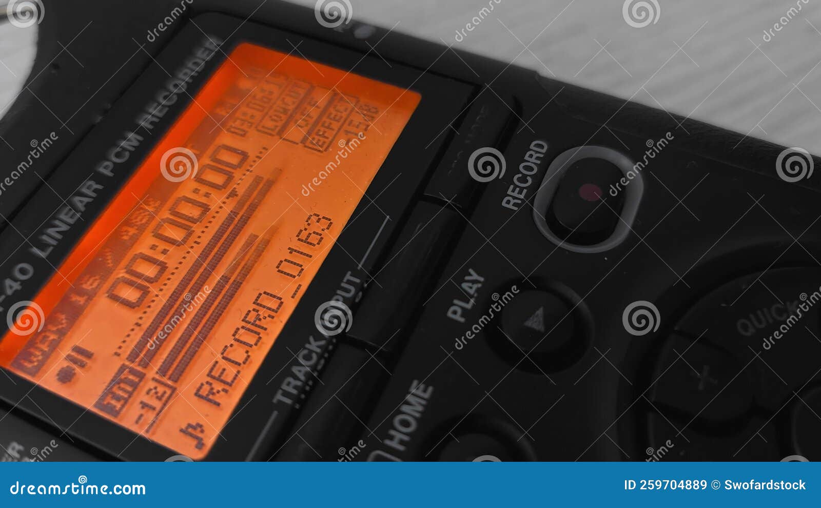 Finger Presses Record Button of Digital Voice Audio Dictophone during ...