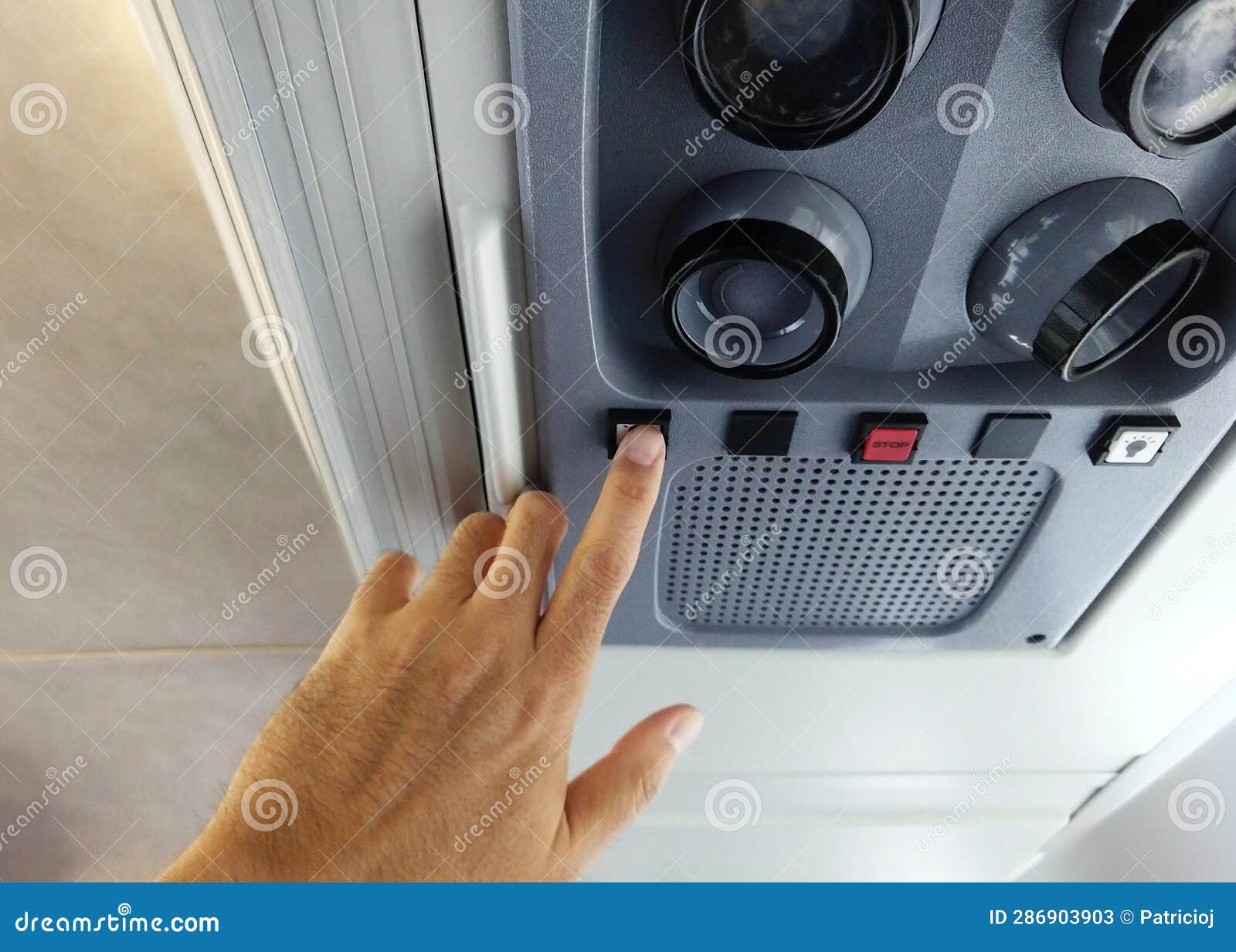 Finger Pressing Controls on Ceiling of Bus or Plane Stock Image - Image ...