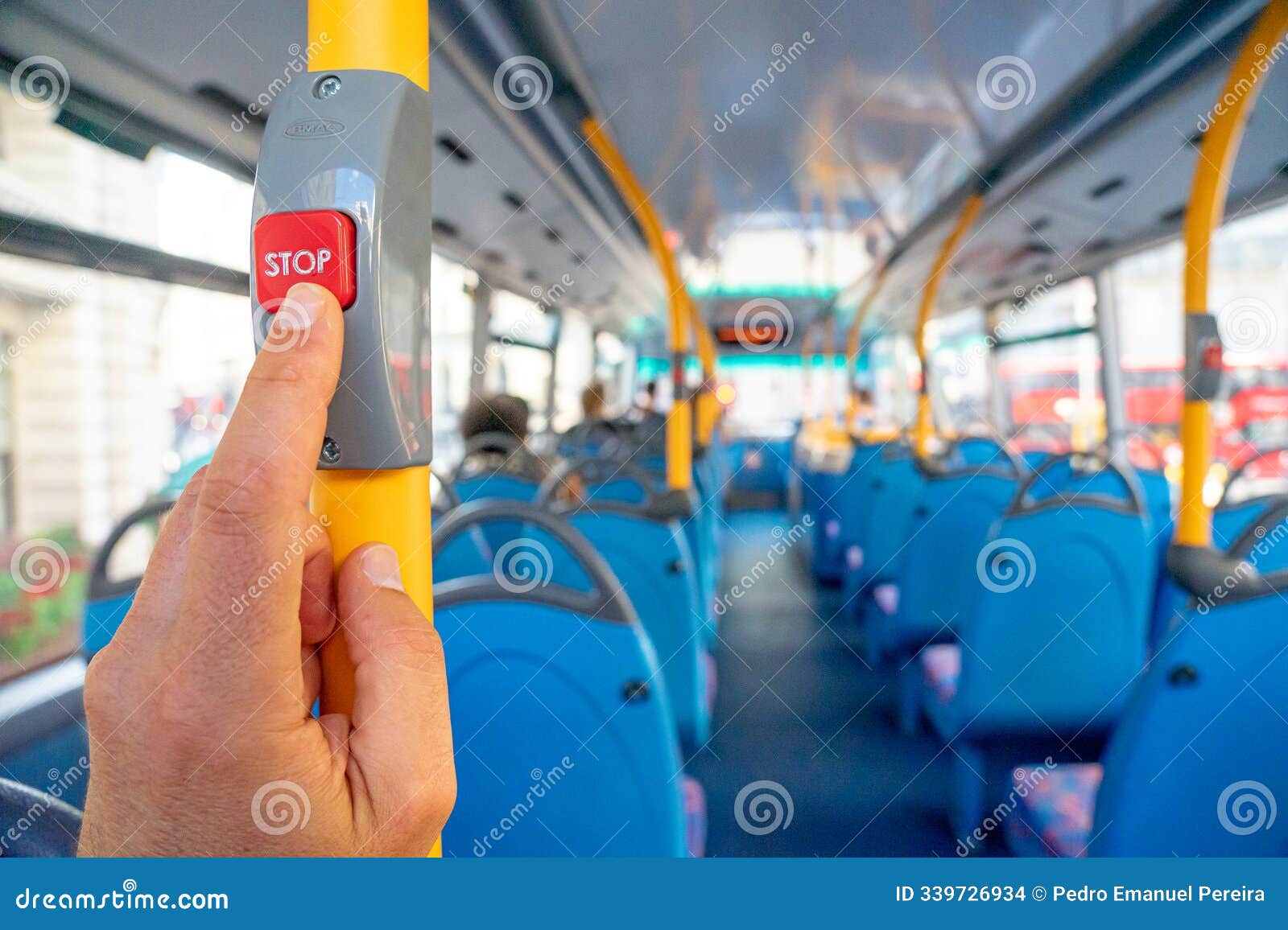 Finger Pressing the Red Stop Button on the First Floor of a Double ...