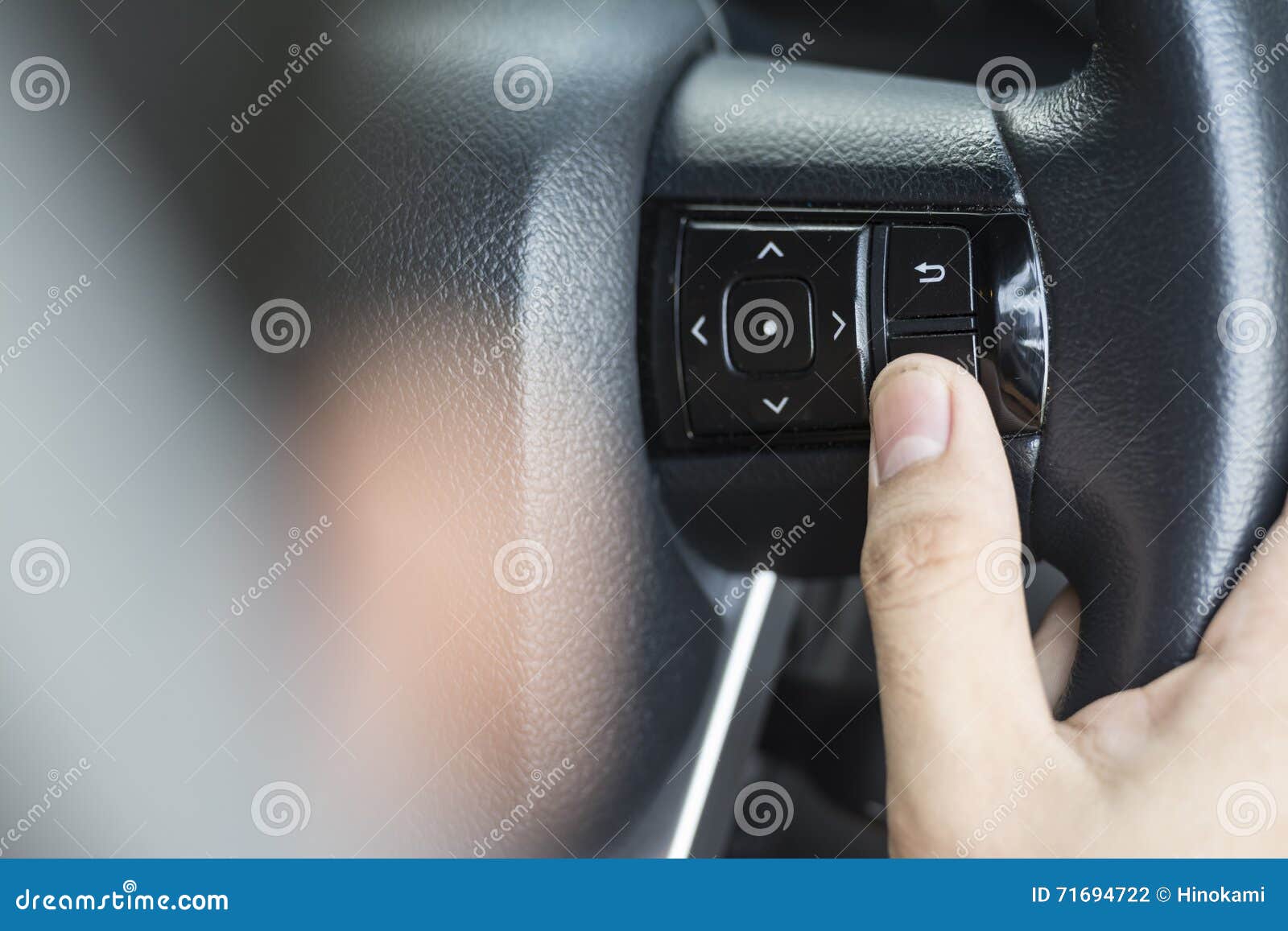 The Finger Push a Button on the Car Steering Wheel Stock Photo - Image ...