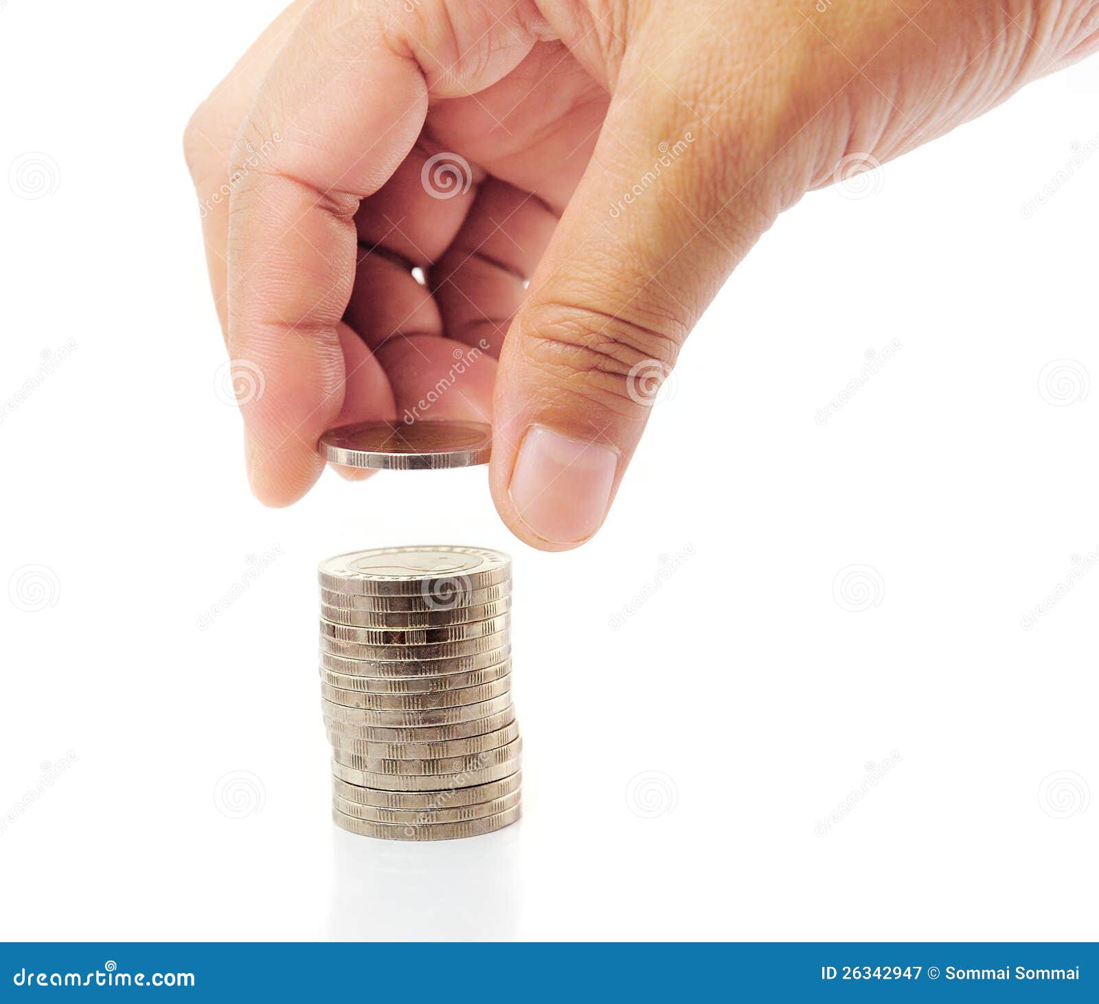 Finger put coin on coin stock image. Image of financial - 26342947