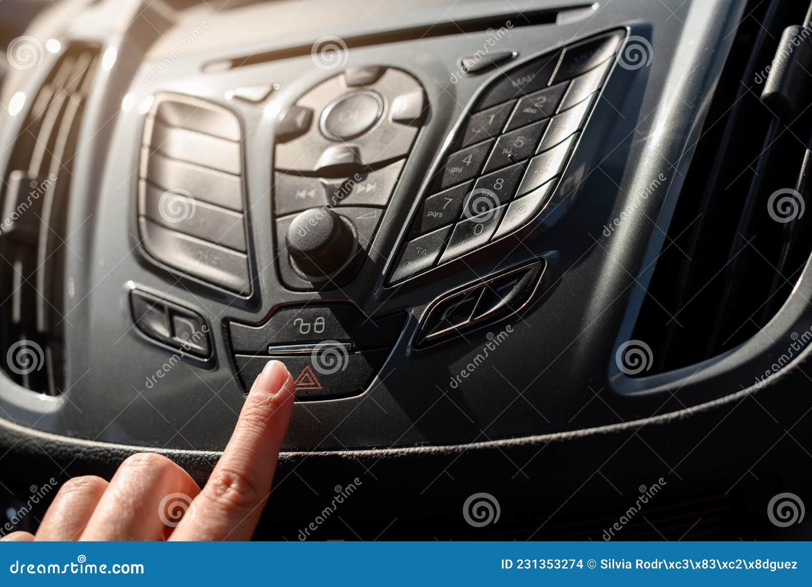 Finger on the Red Triangle Button of a Car`s Hazard Warning Lights ...